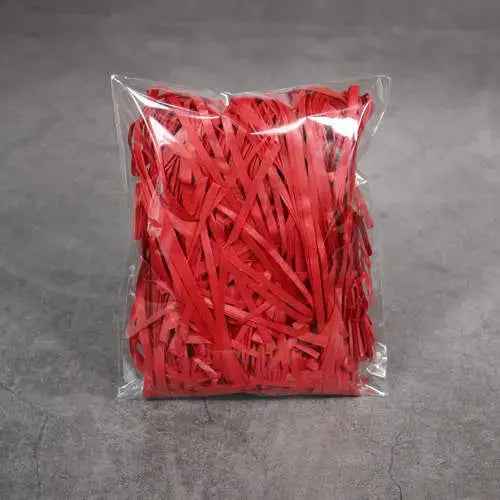 Red Shredded tissue crepe paper 100 grams | Santas Workshop Direct